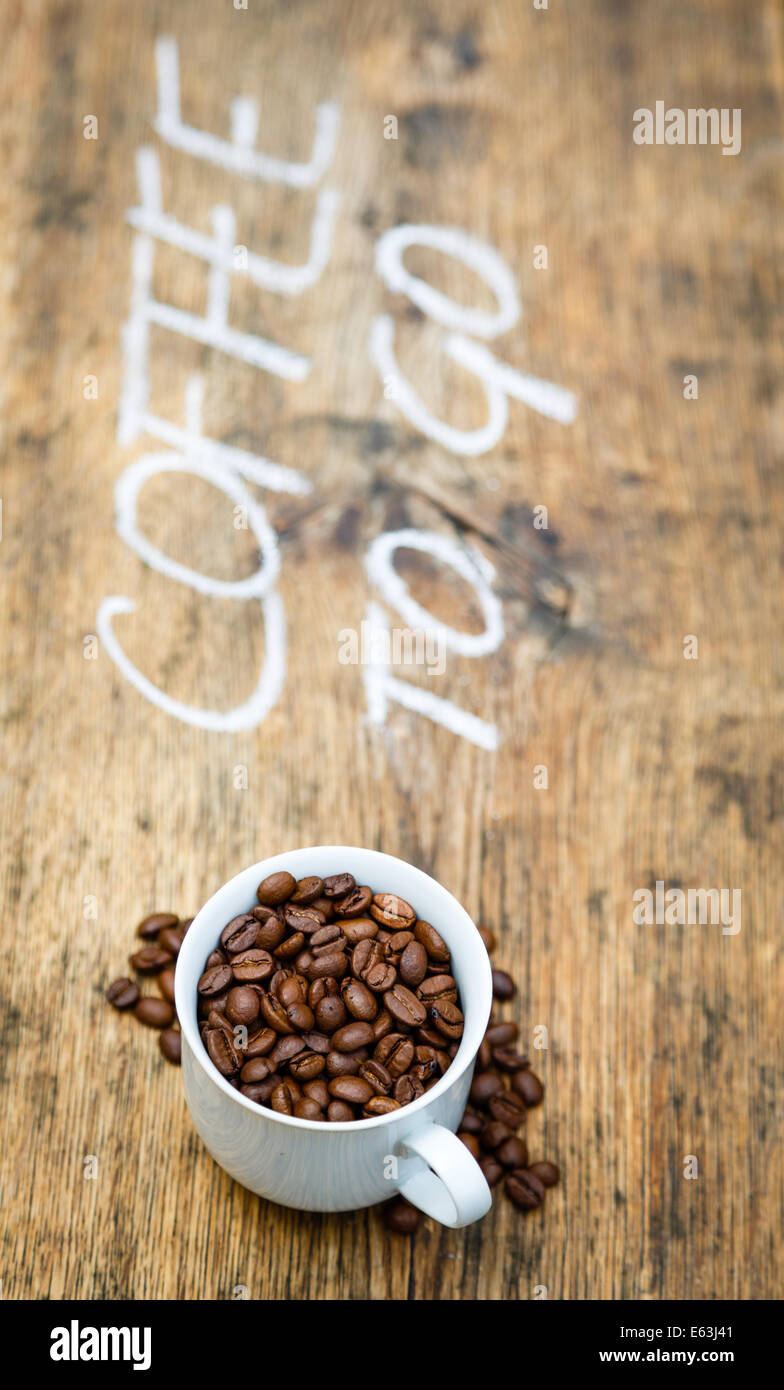 Coffee to go sign with coffee beans Stock Photo - Alamy