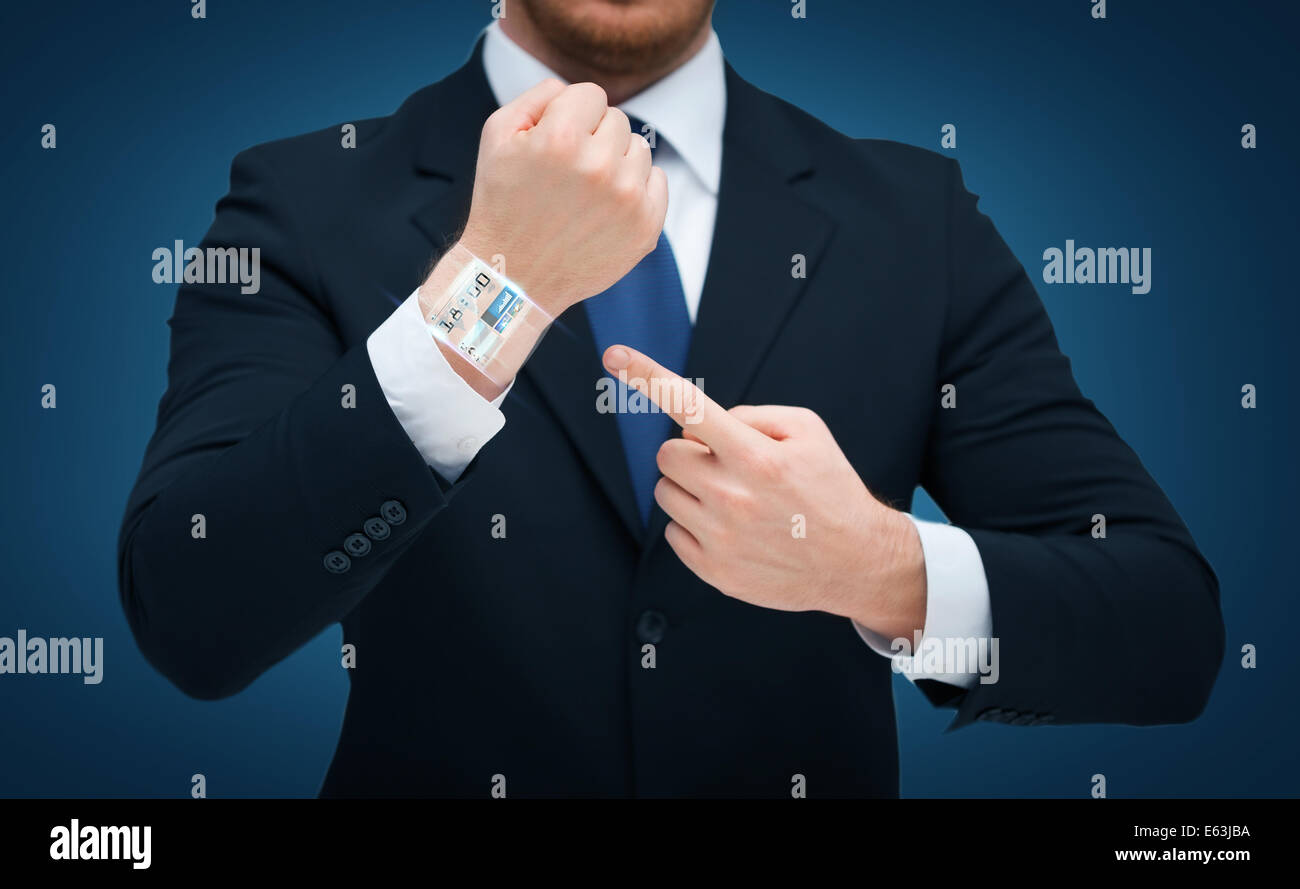 Hand pointing to time hi-res stock photography and images - Alamy