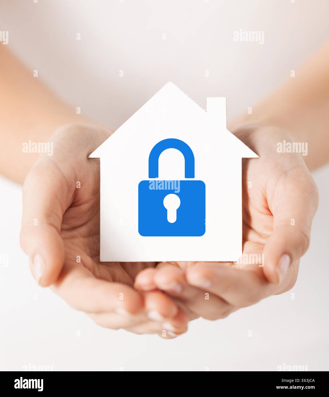hands holding paper house with lock Stock Photo - Alamy