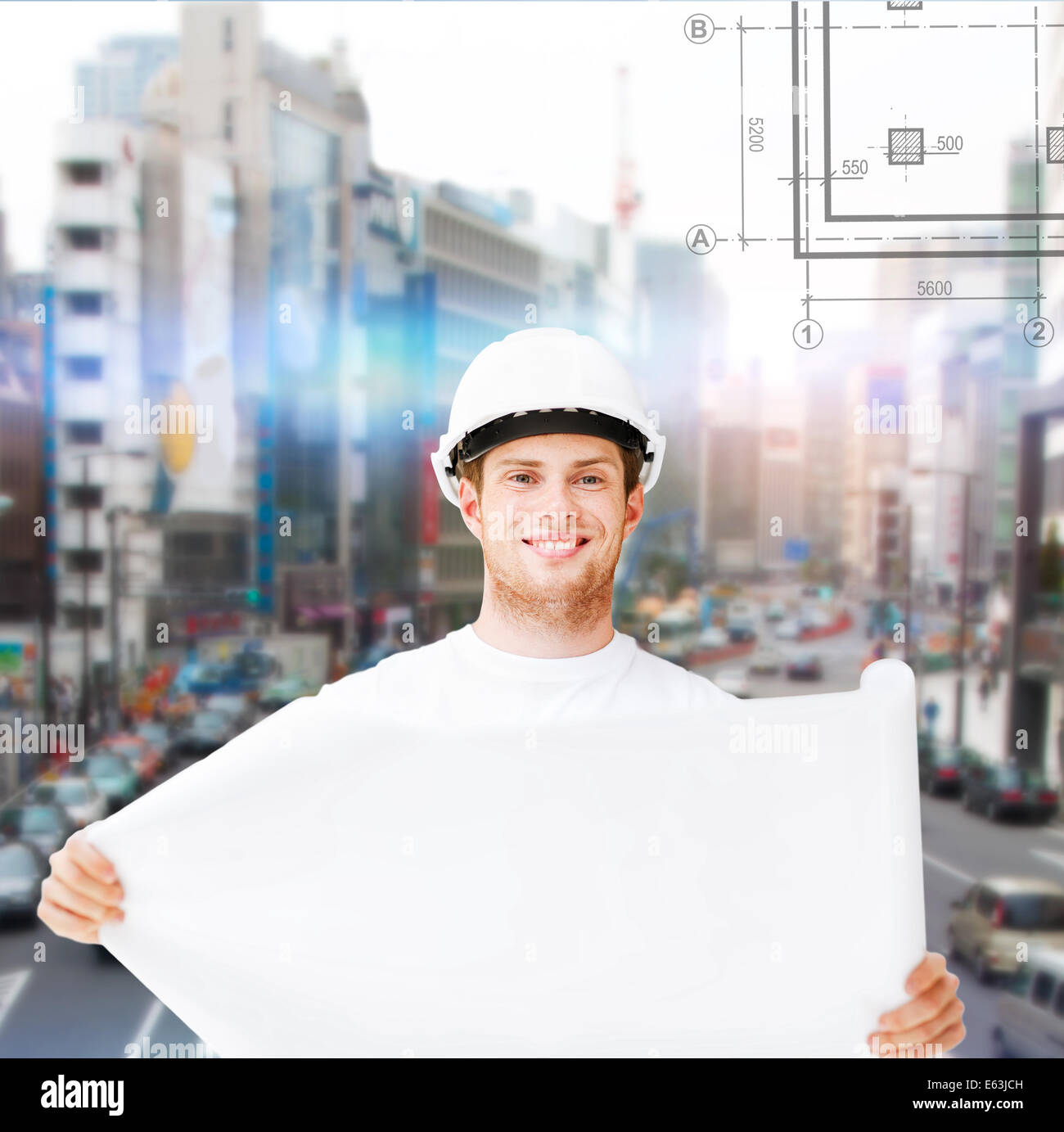 male architect in helmet with blueprint Stock Photo - Alamy