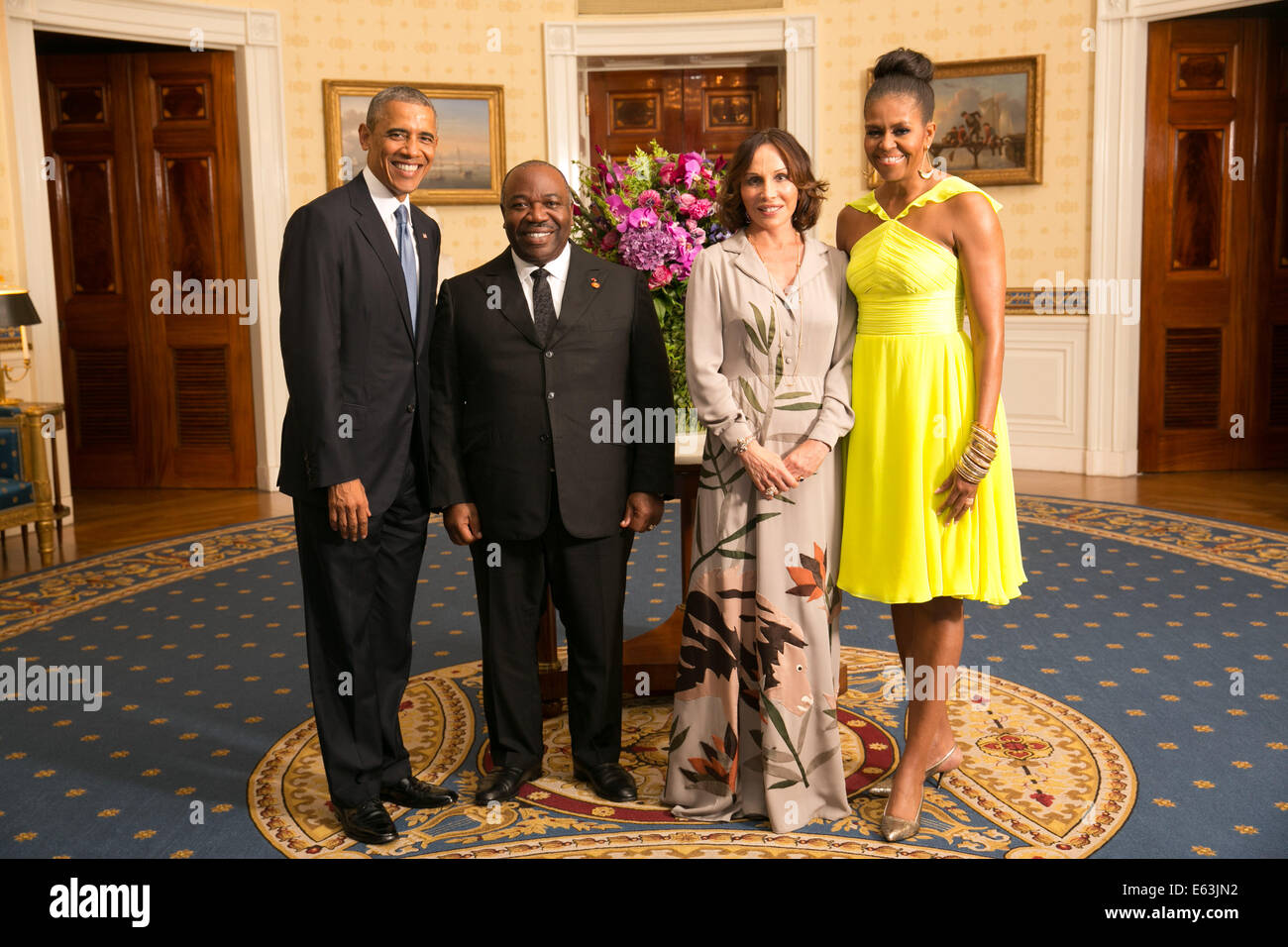 President Barack Obama and First Lady Michelle Obama greet His ...