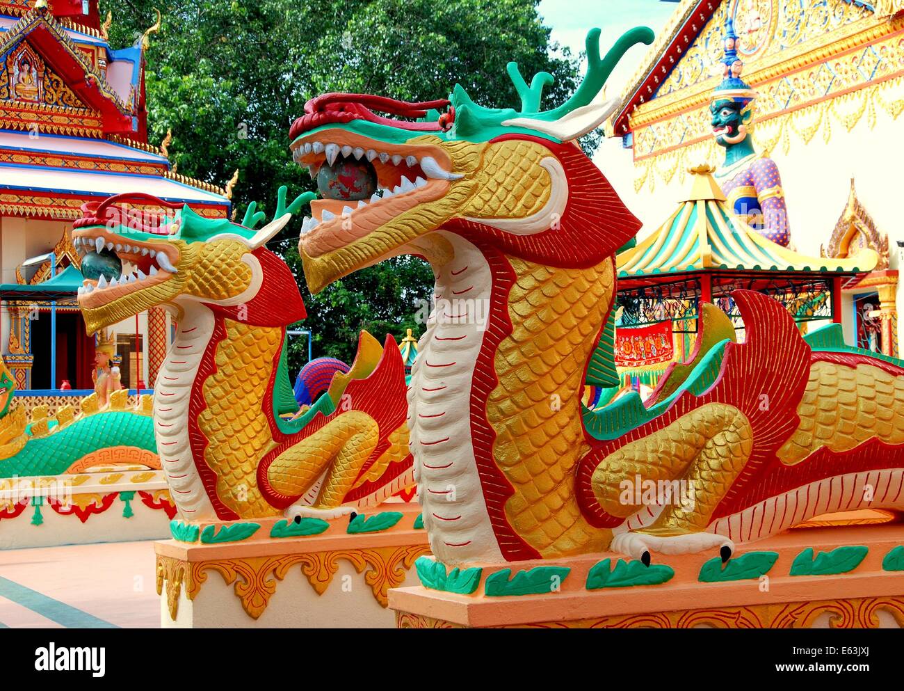 GEORGETOWN, MALAYSIA: Two massive dragons flank the approach to the c ...
