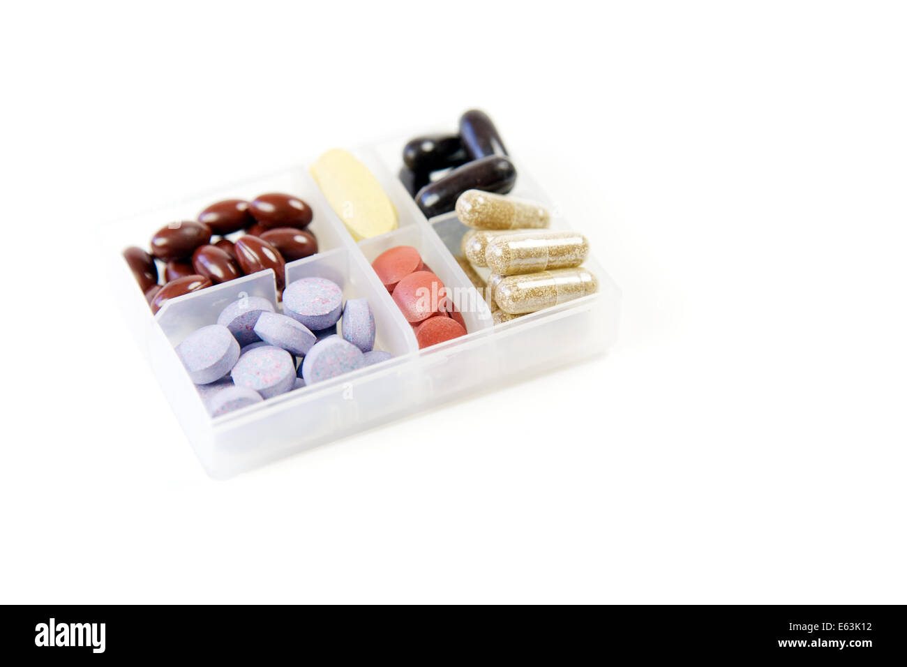 Pills and Capsules in a Container Stock Photo - Alamy