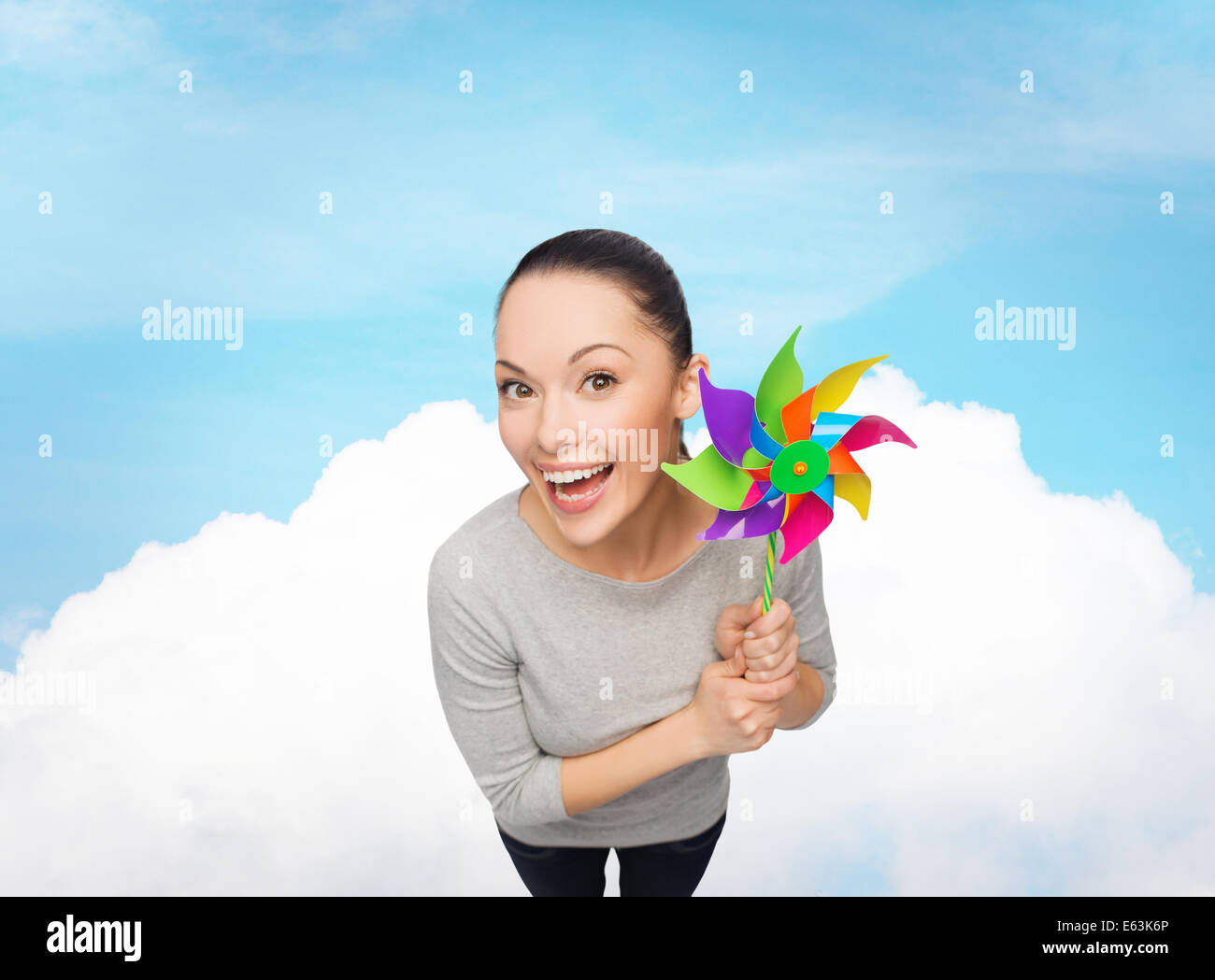 smiling asian woman with windmill Stock Photo - Alamy