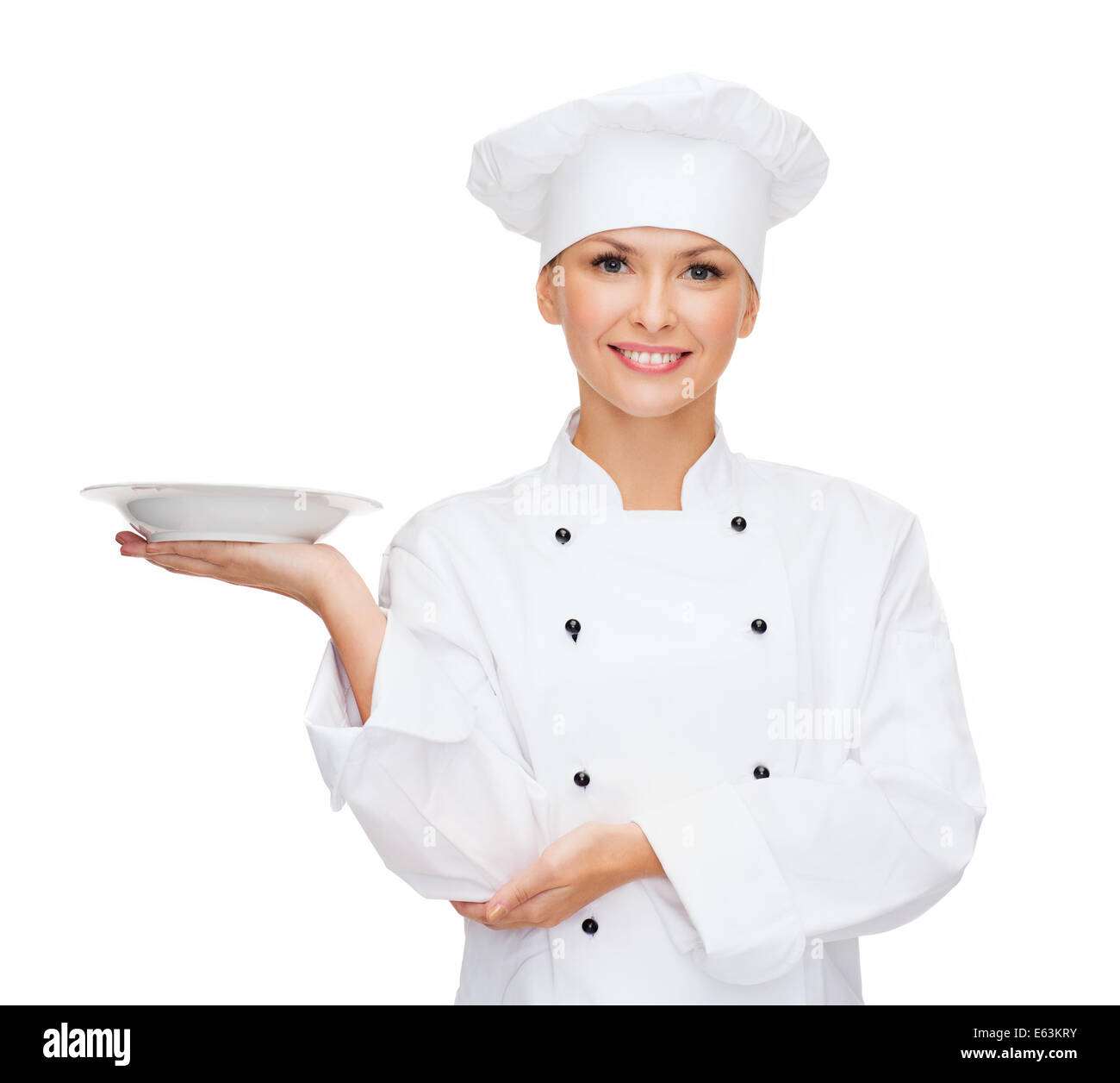 smiling female chef with empty plate Stock Photo - Alamy