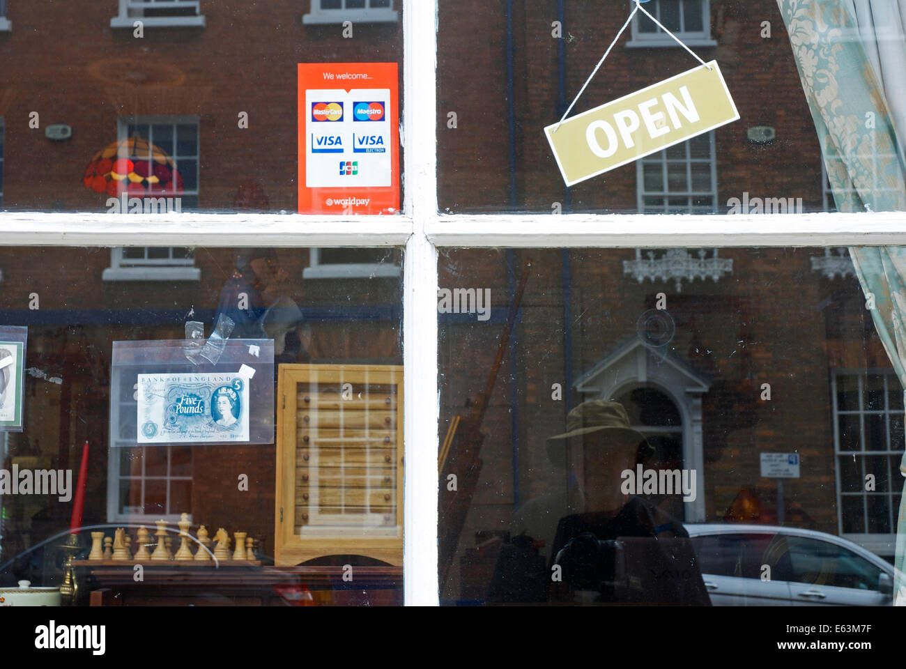 Shop window and open sign Stock Photo - Alamy