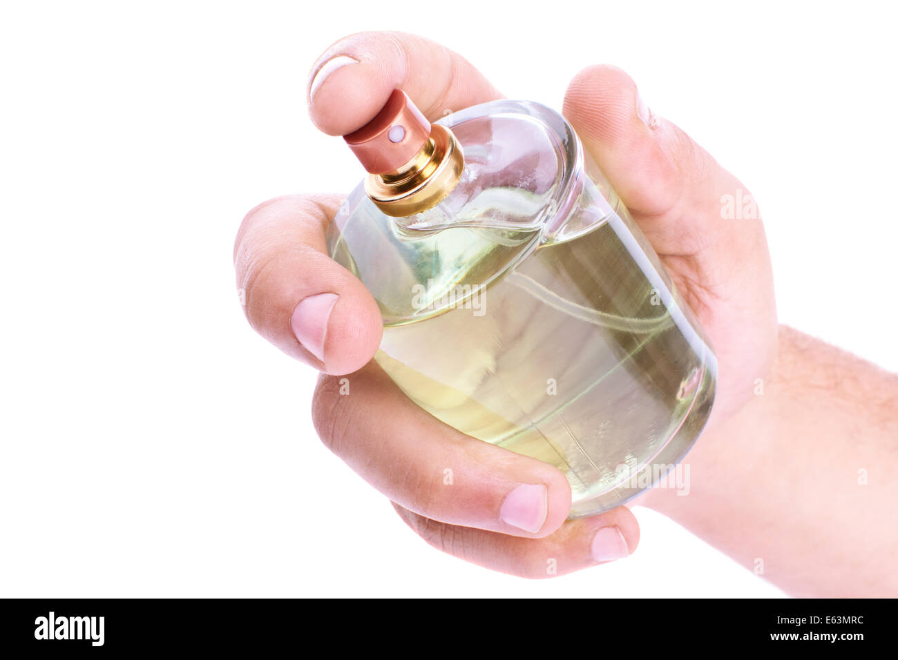 Human hand holding a perfume bottle, isolated on white background Stock ...