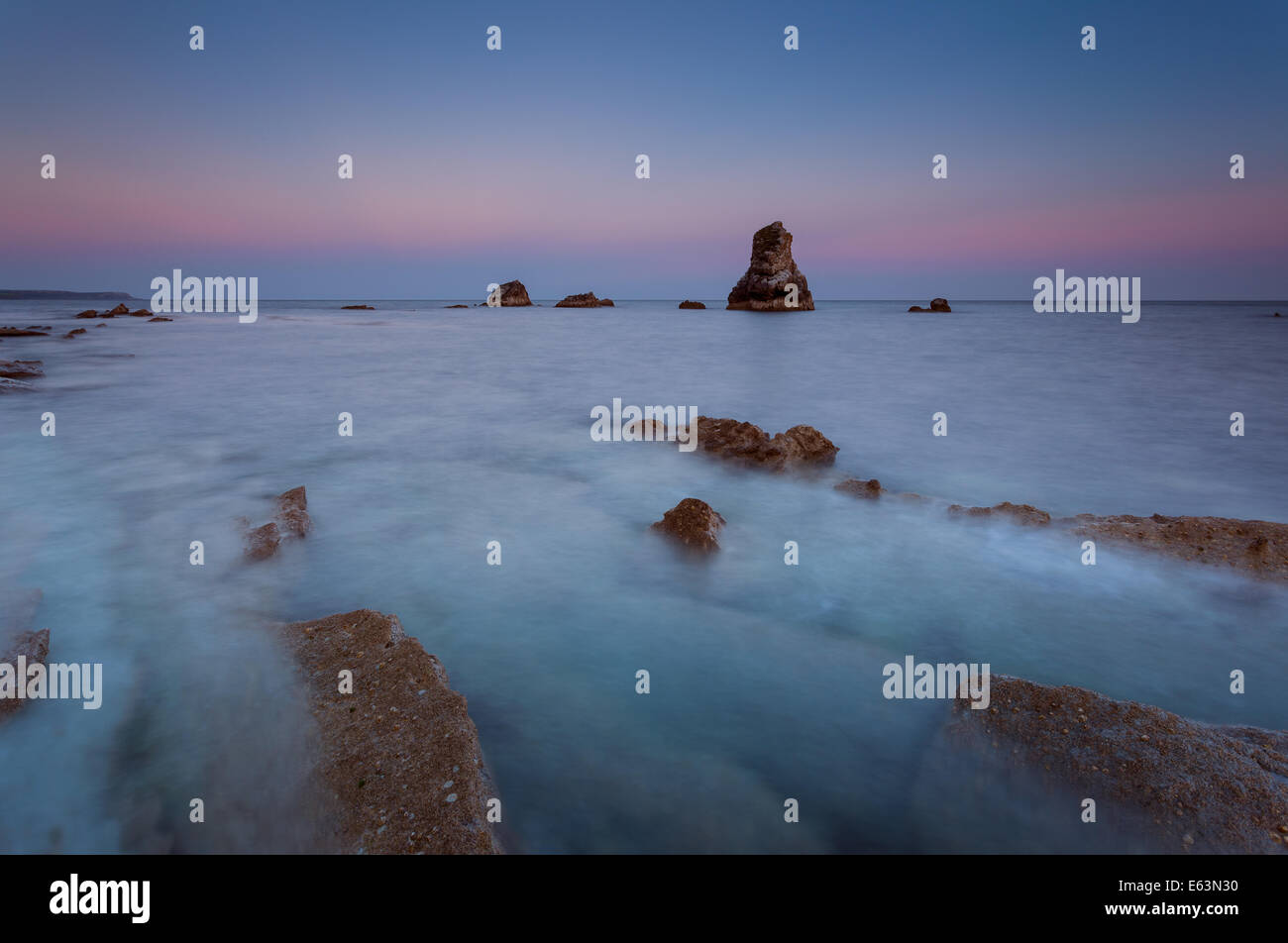 Dusk at Mupe Bay, Dorset Stock Photo - Alamy