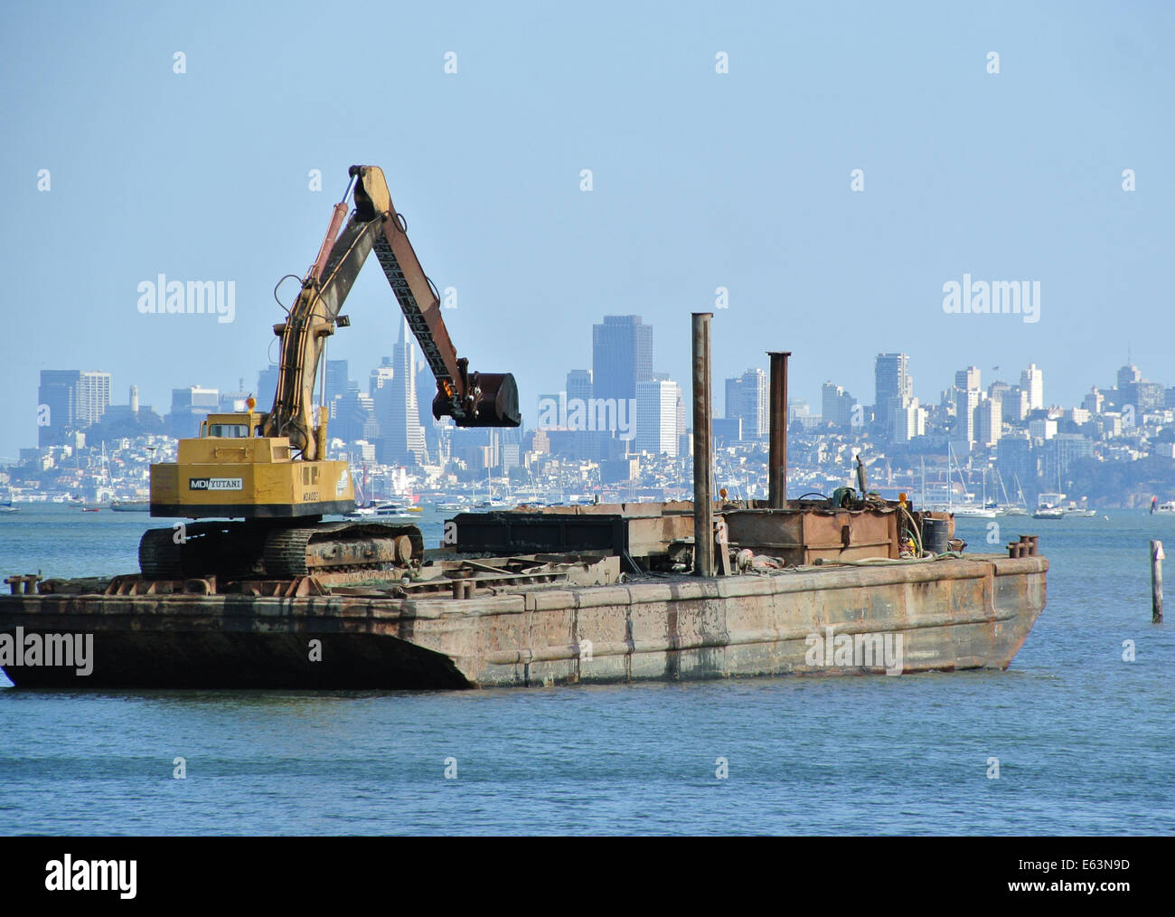 dredging barge removing silt from the Strawberry channel between San ...
