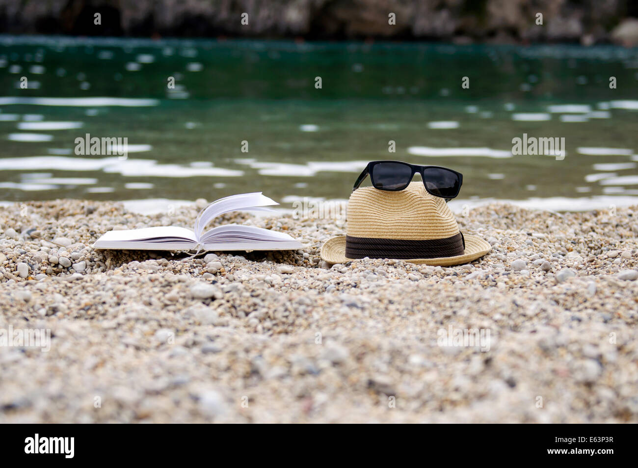 Open book at the beach near the sea Stock Photo - Alamy