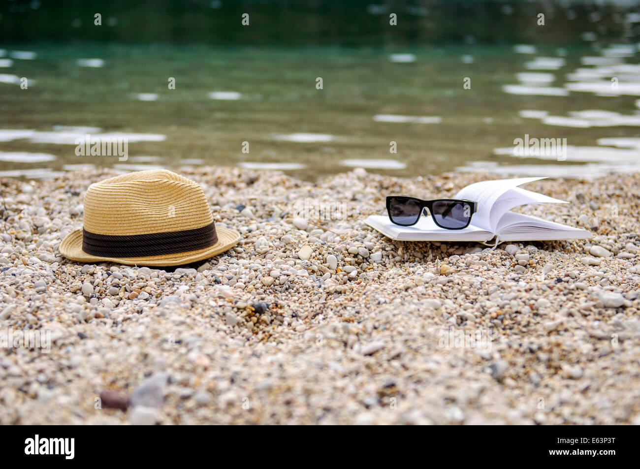 Open book at the beach near the sea Stock Photo - Alamy