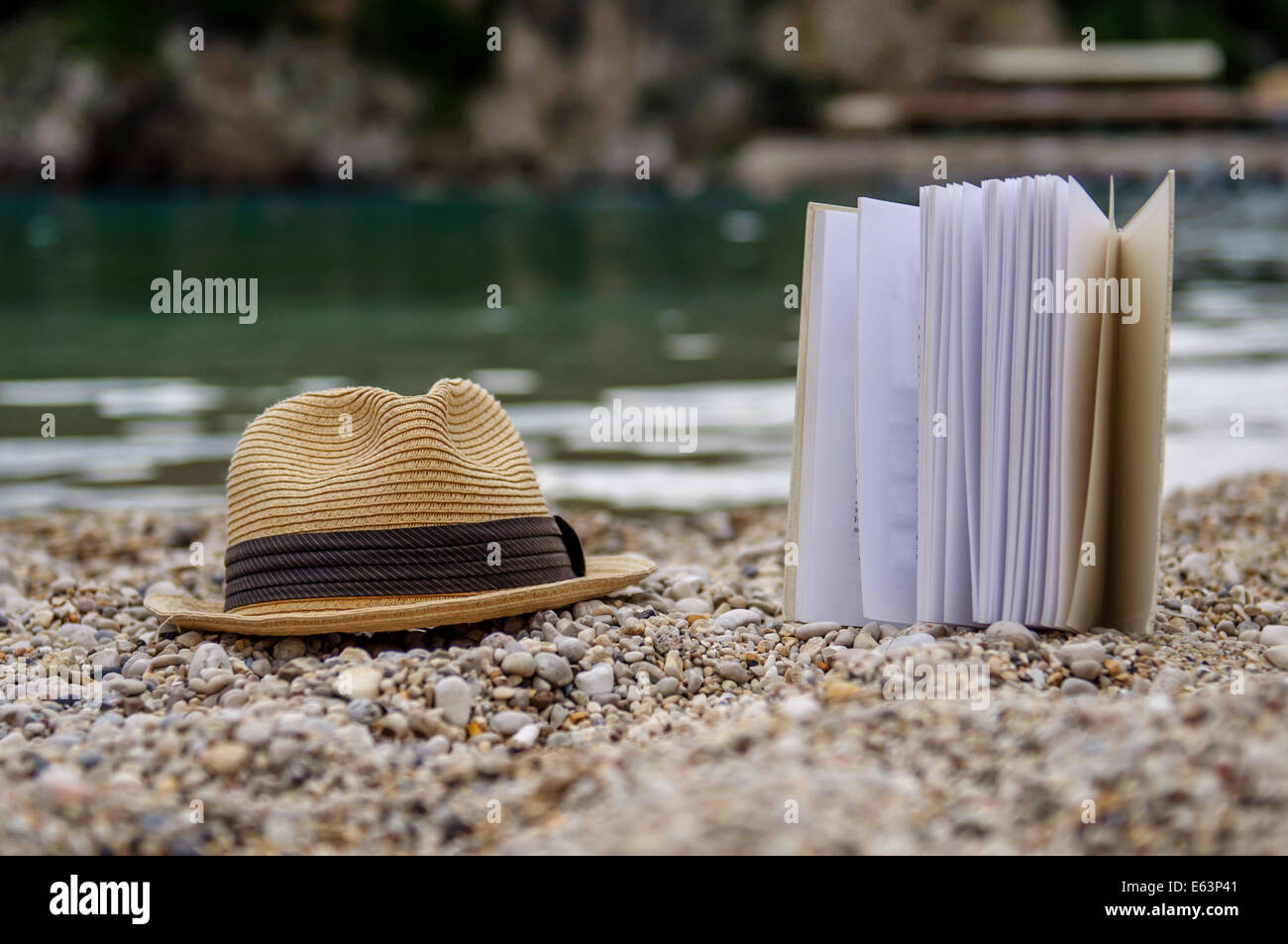 Open book at the beach near the sea Stock Photo - Alamy