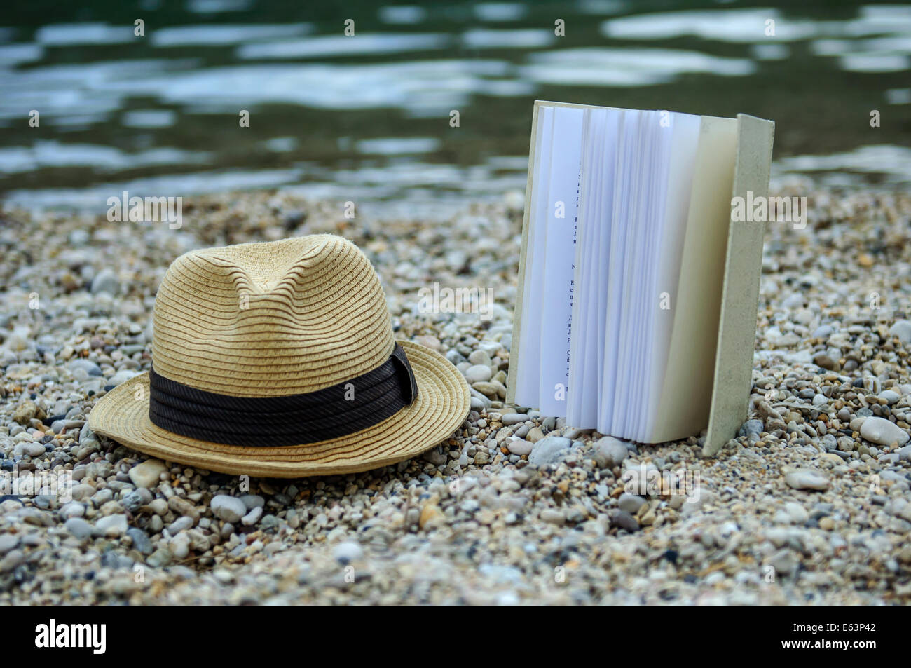 Open book at the beach near the sea Stock Photo - Alamy