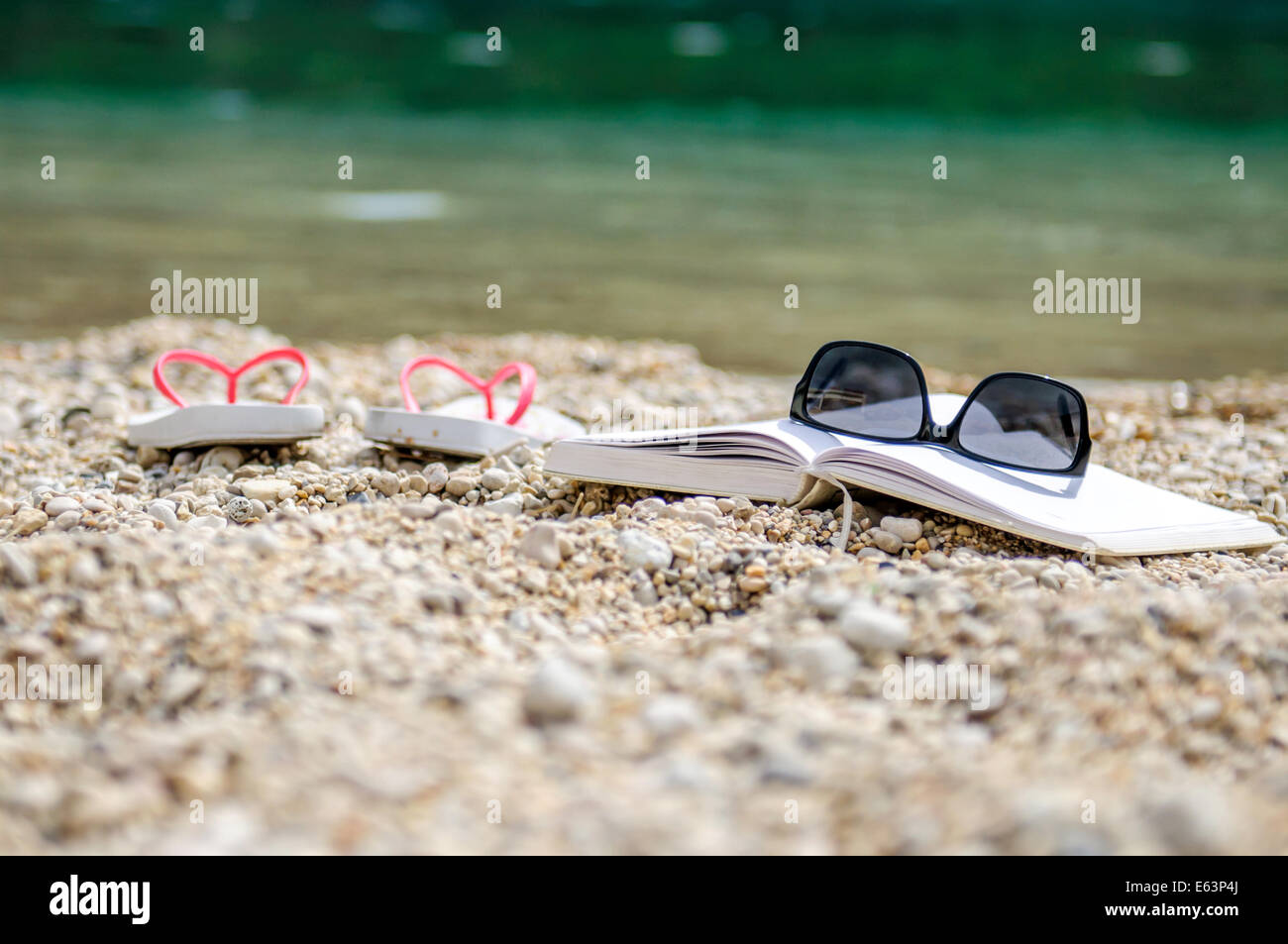 Open book at the beach near the sea Stock Photo - Alamy