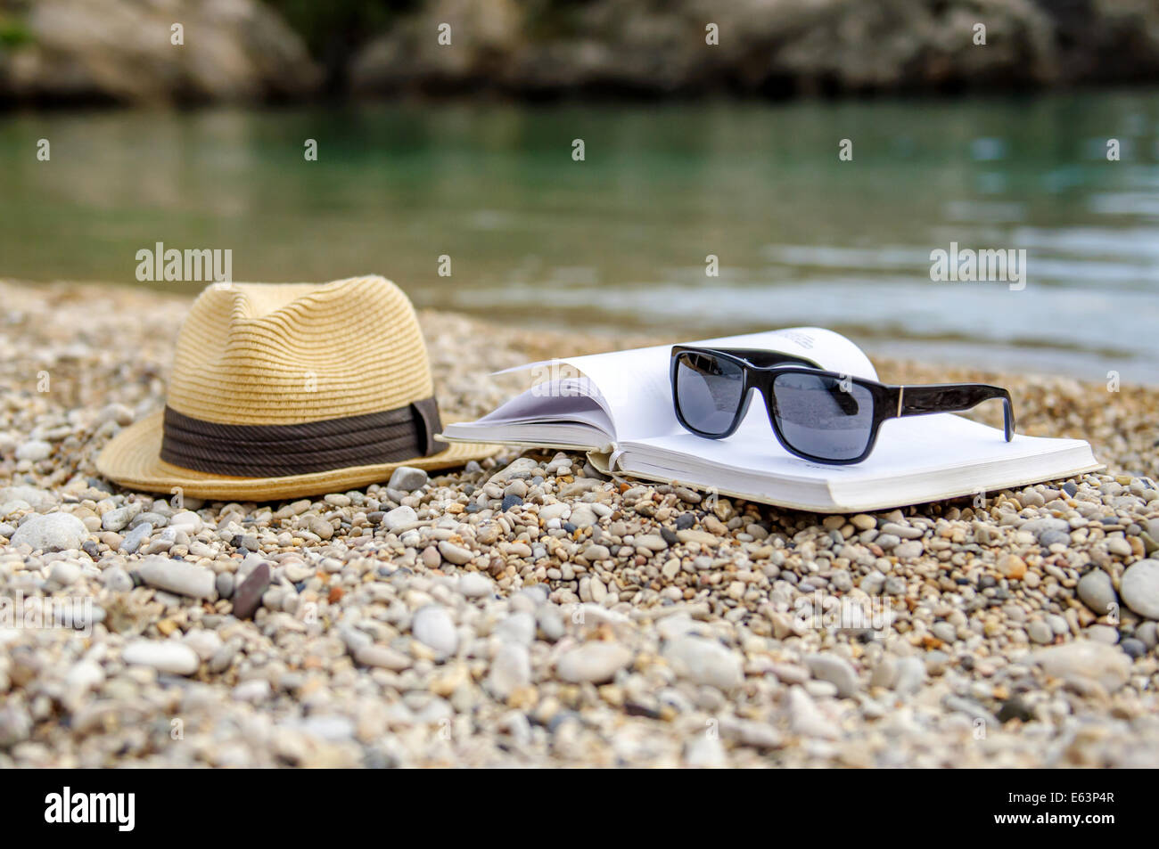 Open book at the beach near the sea Stock Photo - Alamy