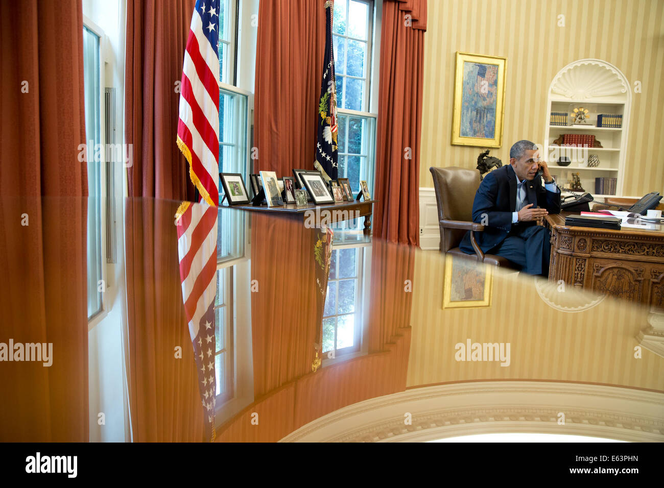 President Barack Obama talks on the phone with British Prime Minister ...
