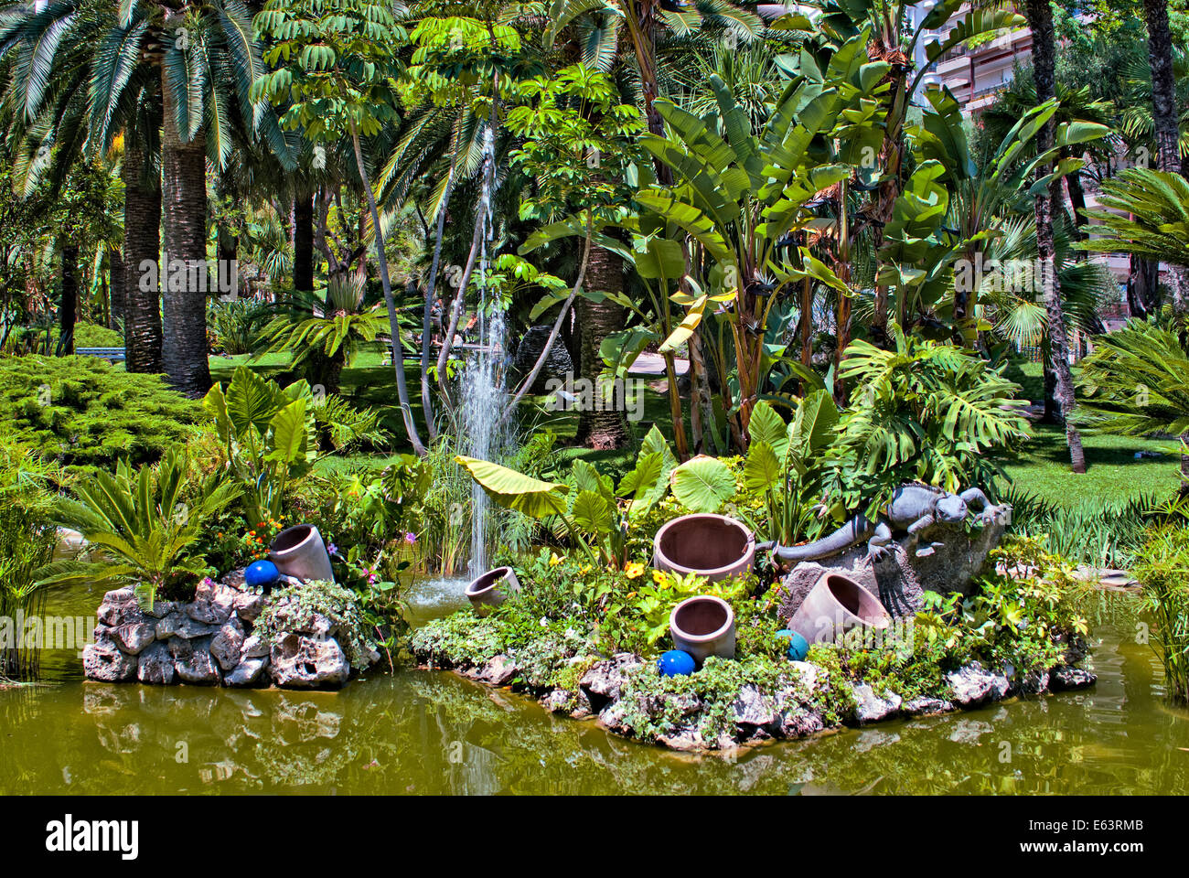 Beautiful garden with pond Stock Photo - Alamy