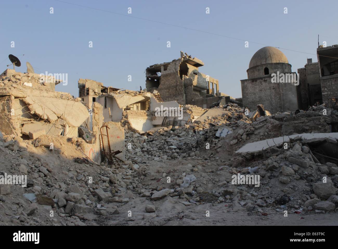 Aleppo, Syria. 13th Aug, 2014. A view of a damaged buildings after ...