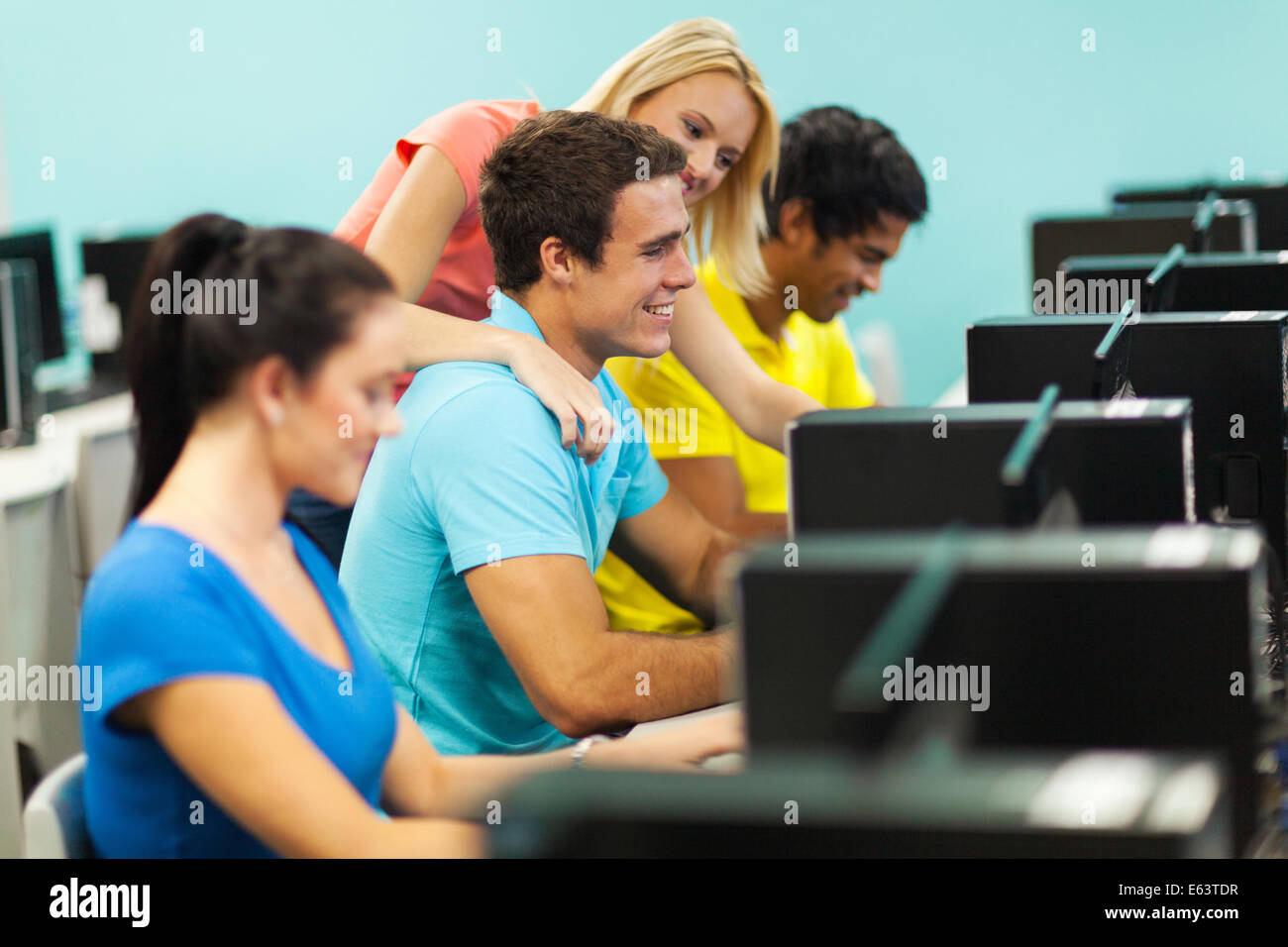 multiracial college students in computer lab Stock Photo - Alamy
