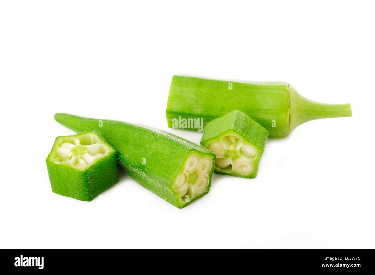Okra on white background Stock Photo - Alamy