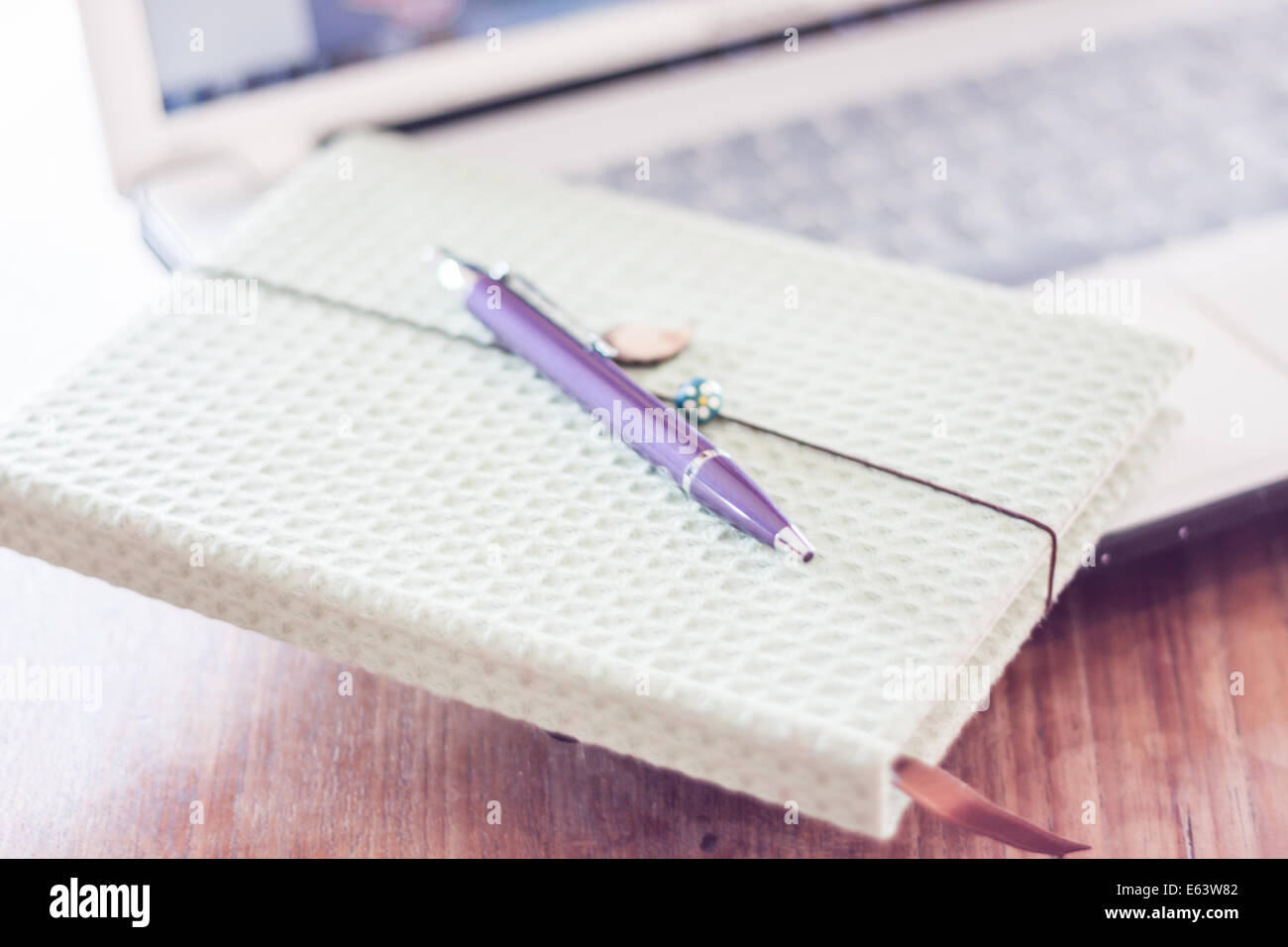 Wooden office table computer notepad hi-res stock photography and ...