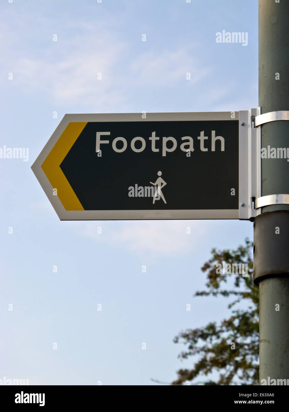 A sign showing a public footpath route Stock Photo - Alamy