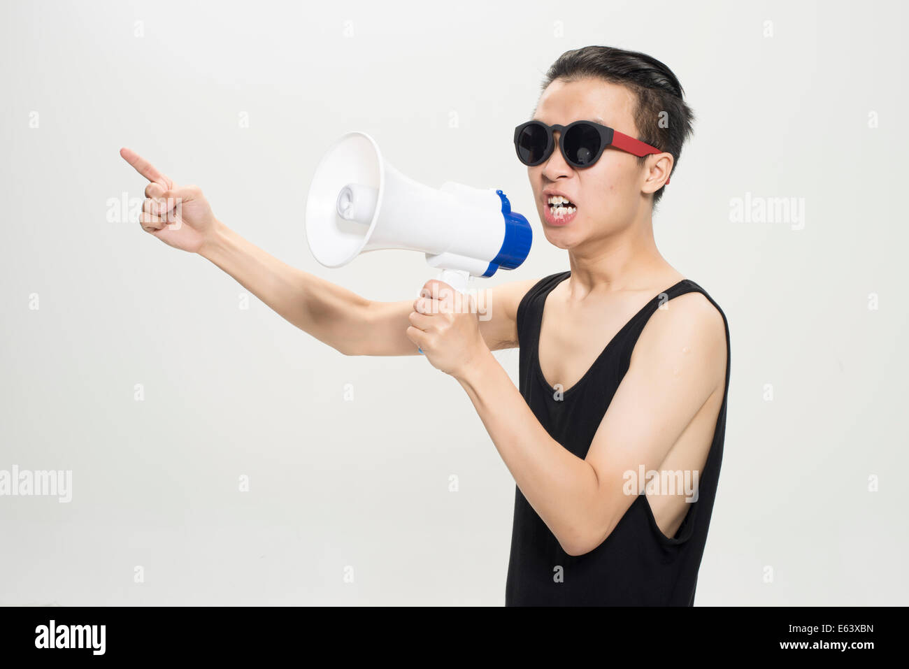 Funky man with loud speaker Stock Photo - Alamy
