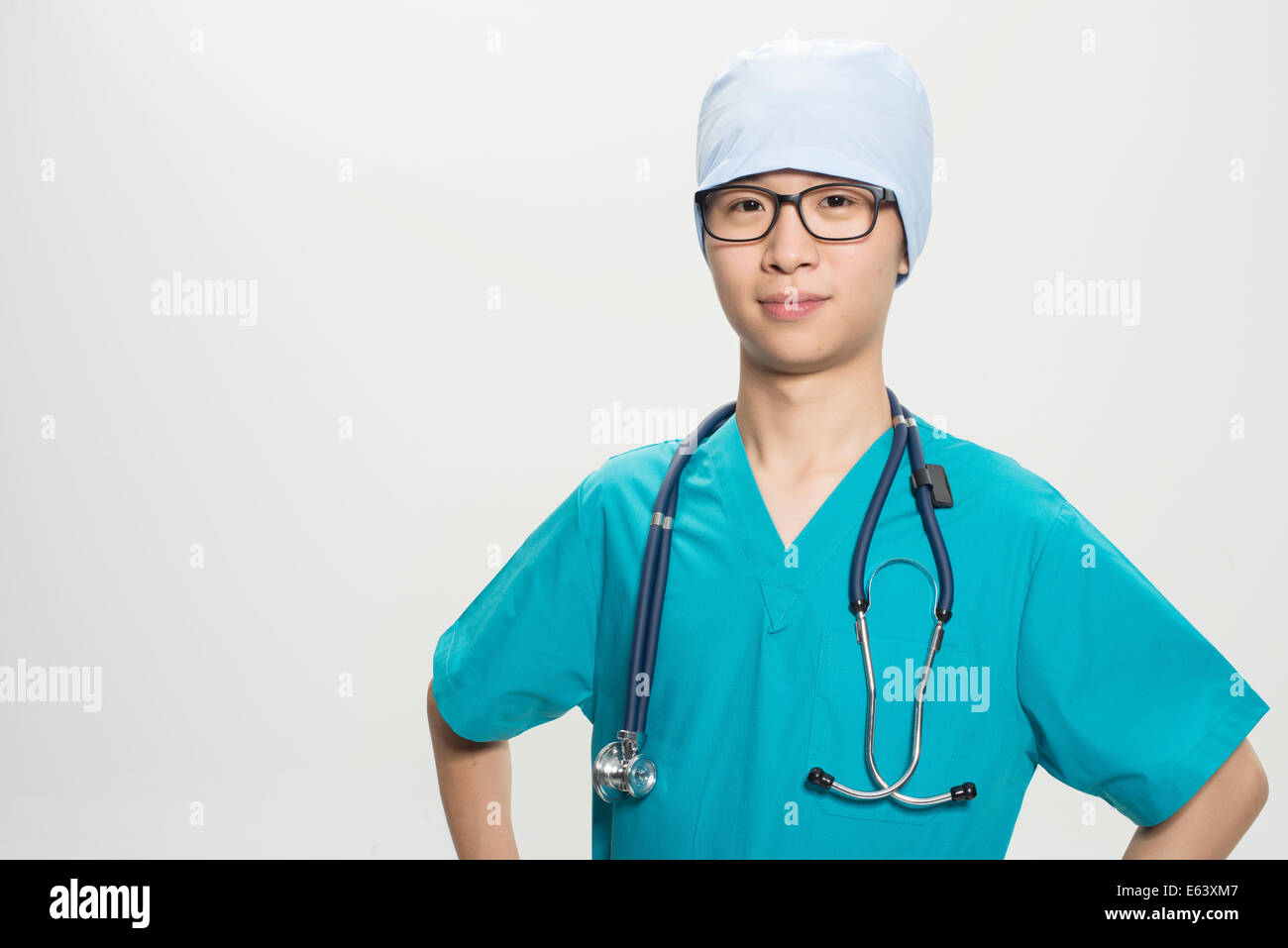 Portrait of Young Asian Chinese Male Doctor standing with confidence ...