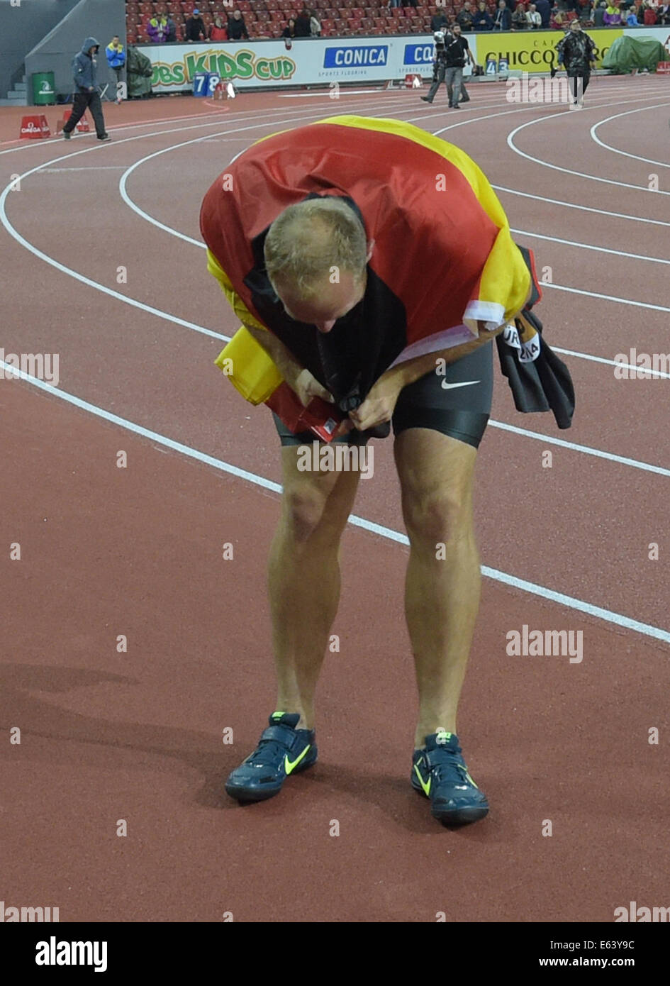 Gold medalist Robert Harting of Germany celebrates after the men's ...