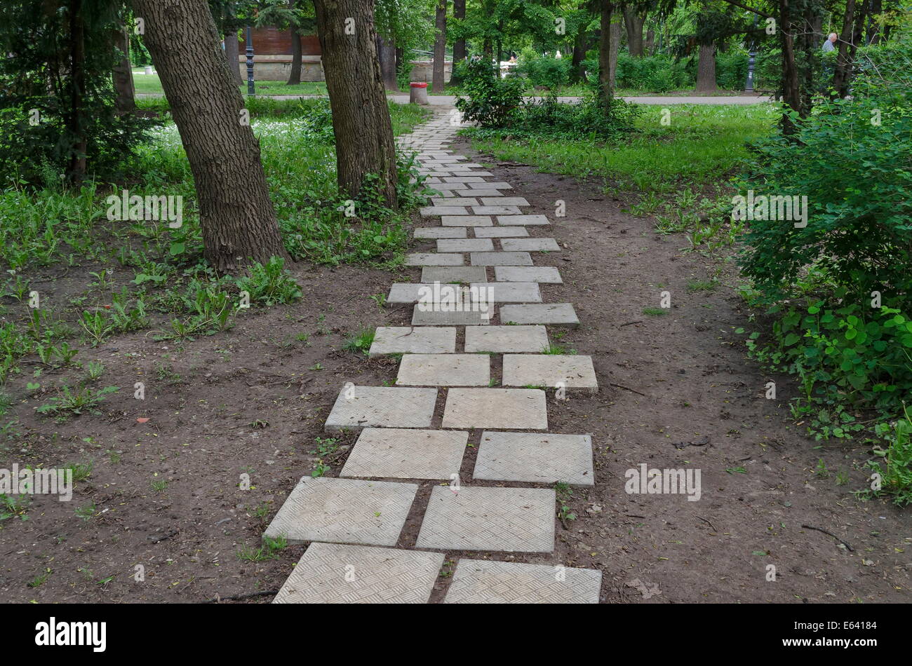 Tiled path way in garden Stock Photo - Alamy