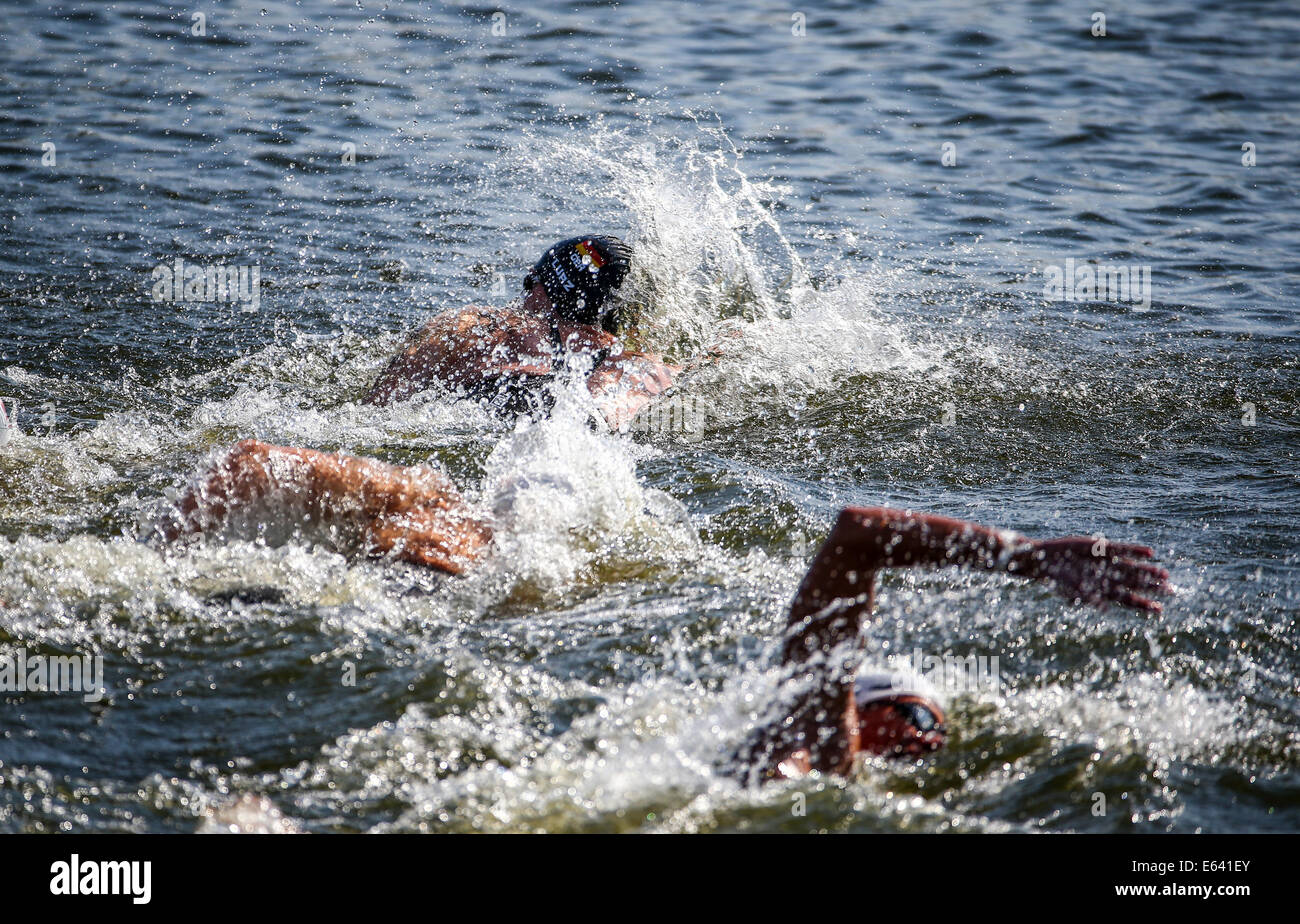 Berlin, Germany. 14th Aug, 2014. Thomas Lurz of Germany leads the pack ...