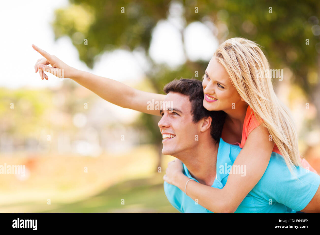 Couple pointing up hi-res stock photography and images - Alamy