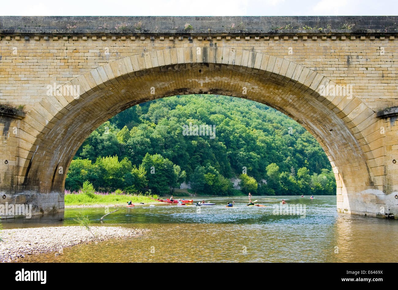 Arch of the bridge of Grolejac over the river Dordogne in France Stock ...