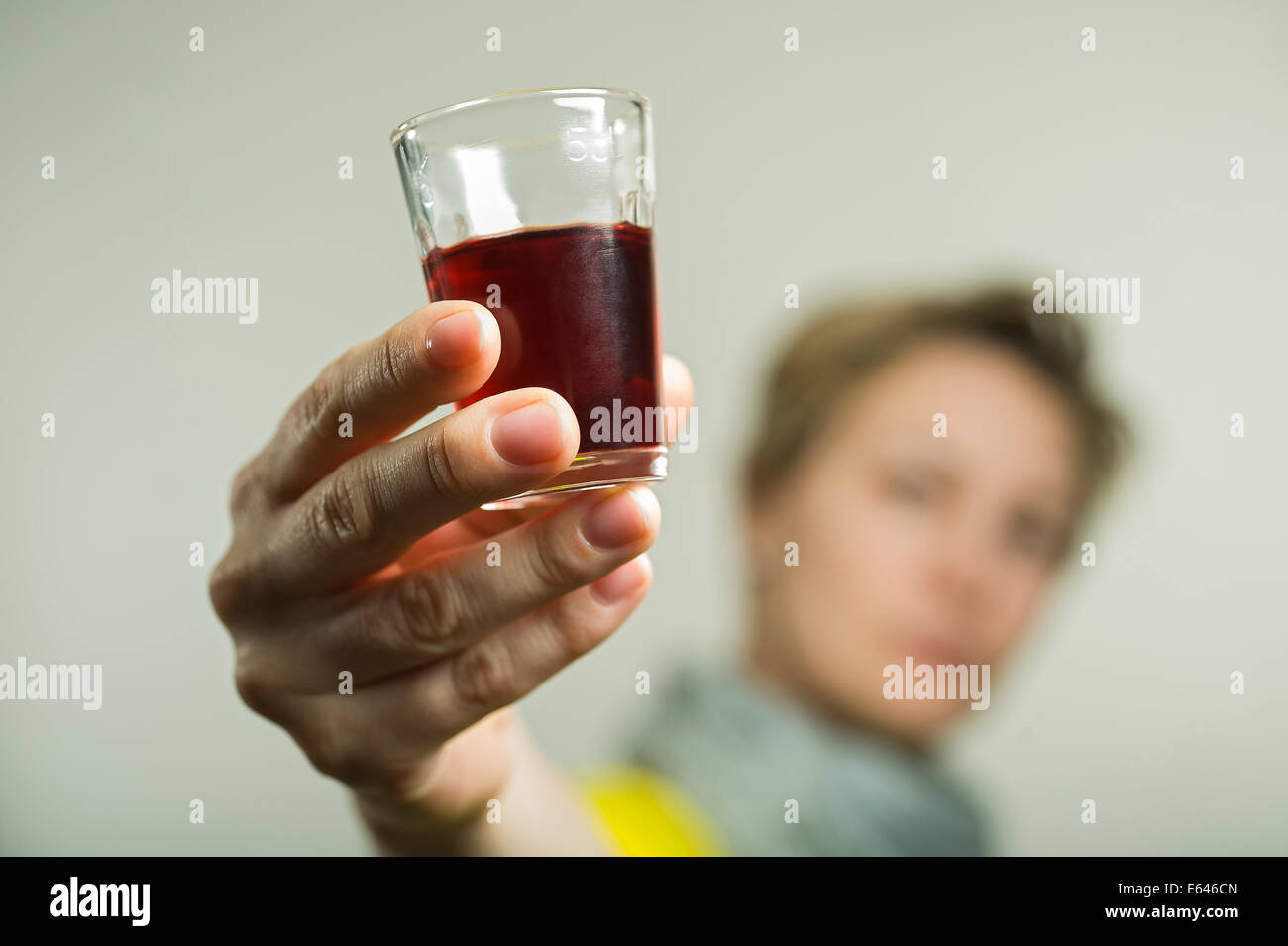 girl holding shot Stock Photo - Alamy