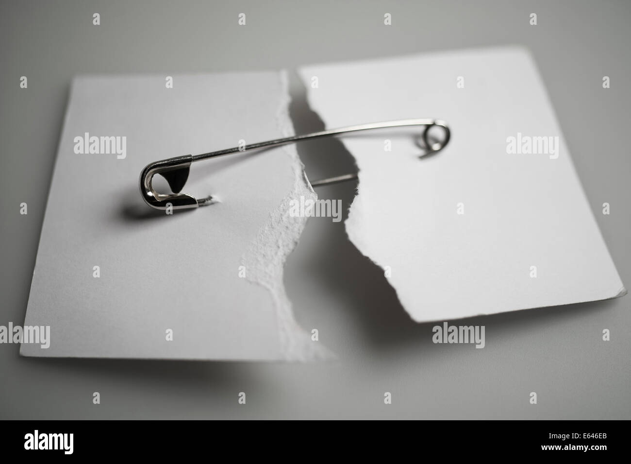 clamps visiting card with safety pin Stock Photo - Alamy