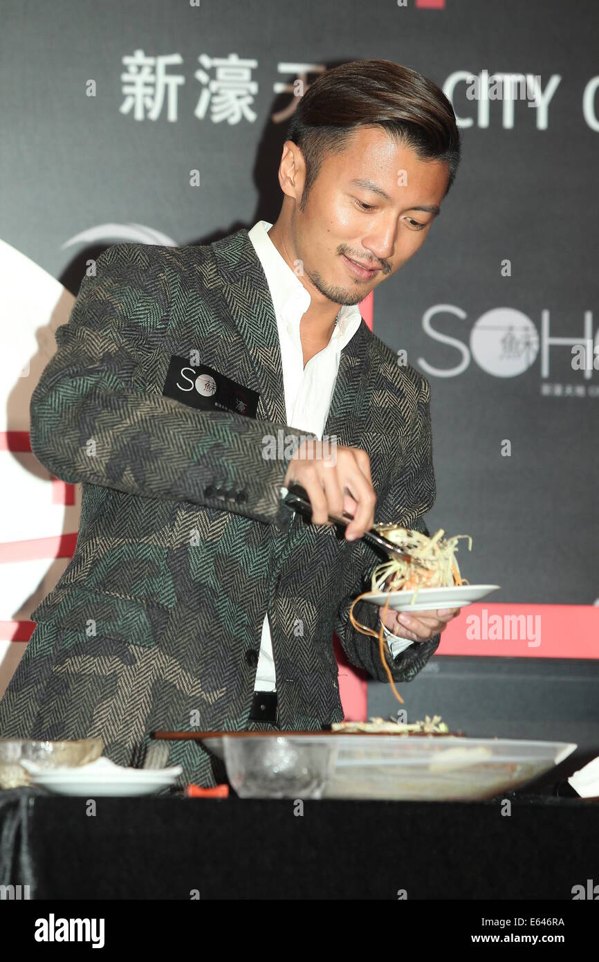Hong Kong, China. 13th Aug, 2014. Singer Nicholas Tse attends opening ceremony of SOHO at City ...