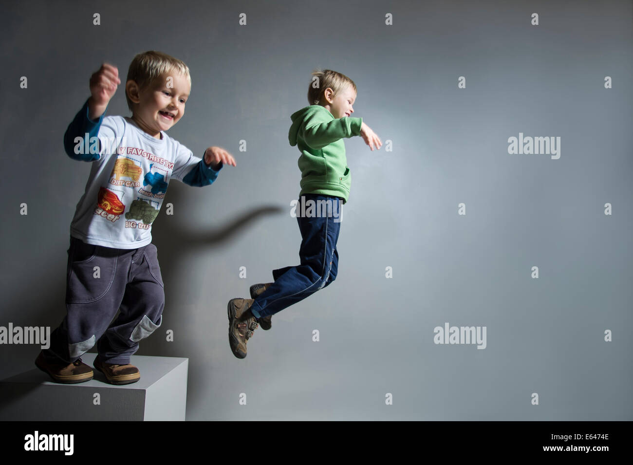 two jumping boys Stock Photo - Alamy