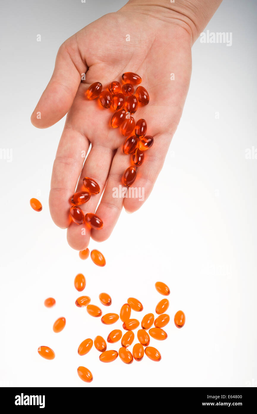 Fish oil capsule Stock Photo - Alamy