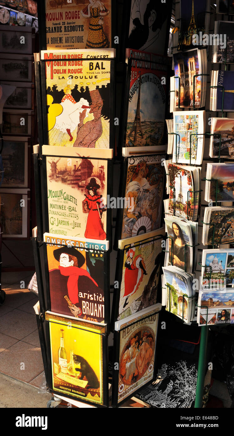 PARIS, FRANCE - MARCH 29, 2011: Various postcards from Paris for sale ...