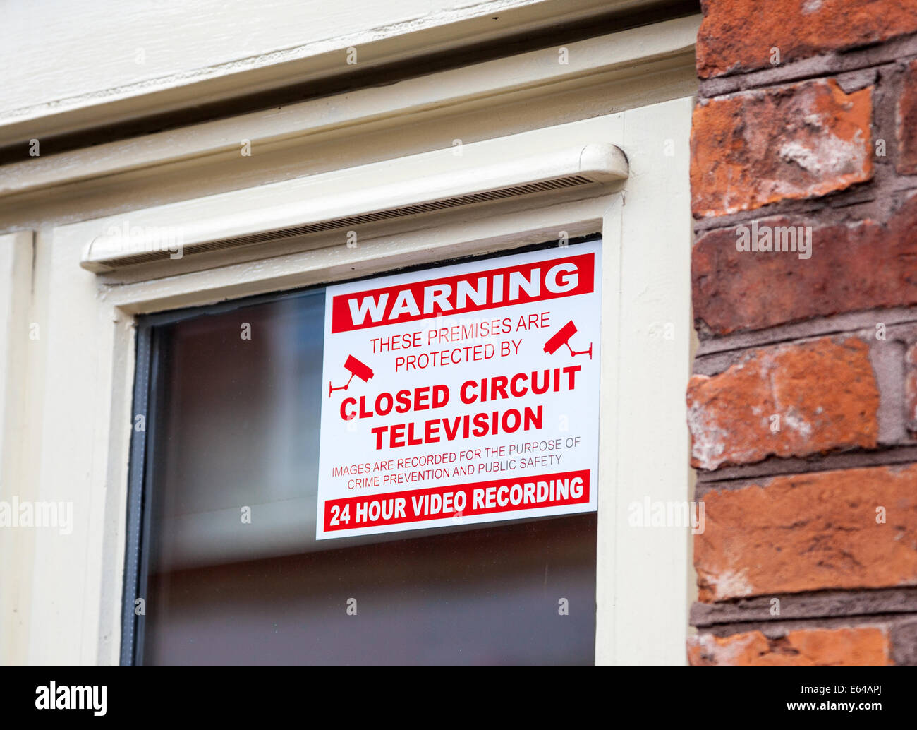 A sign warning that the premises are protected by close circuit ...