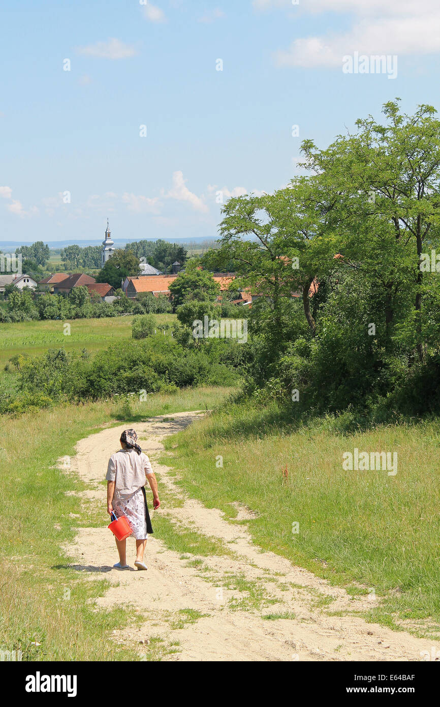 Peasant woman walking hi-res stock photography and images - Alamy