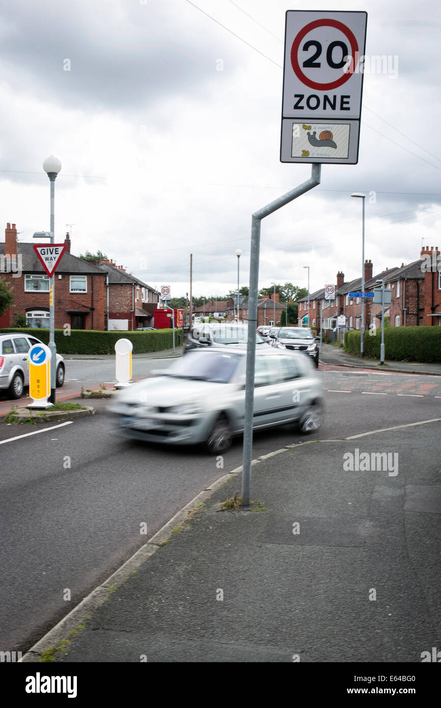 20 miles per hour road sign in Manchester Stock Photo - Alamy