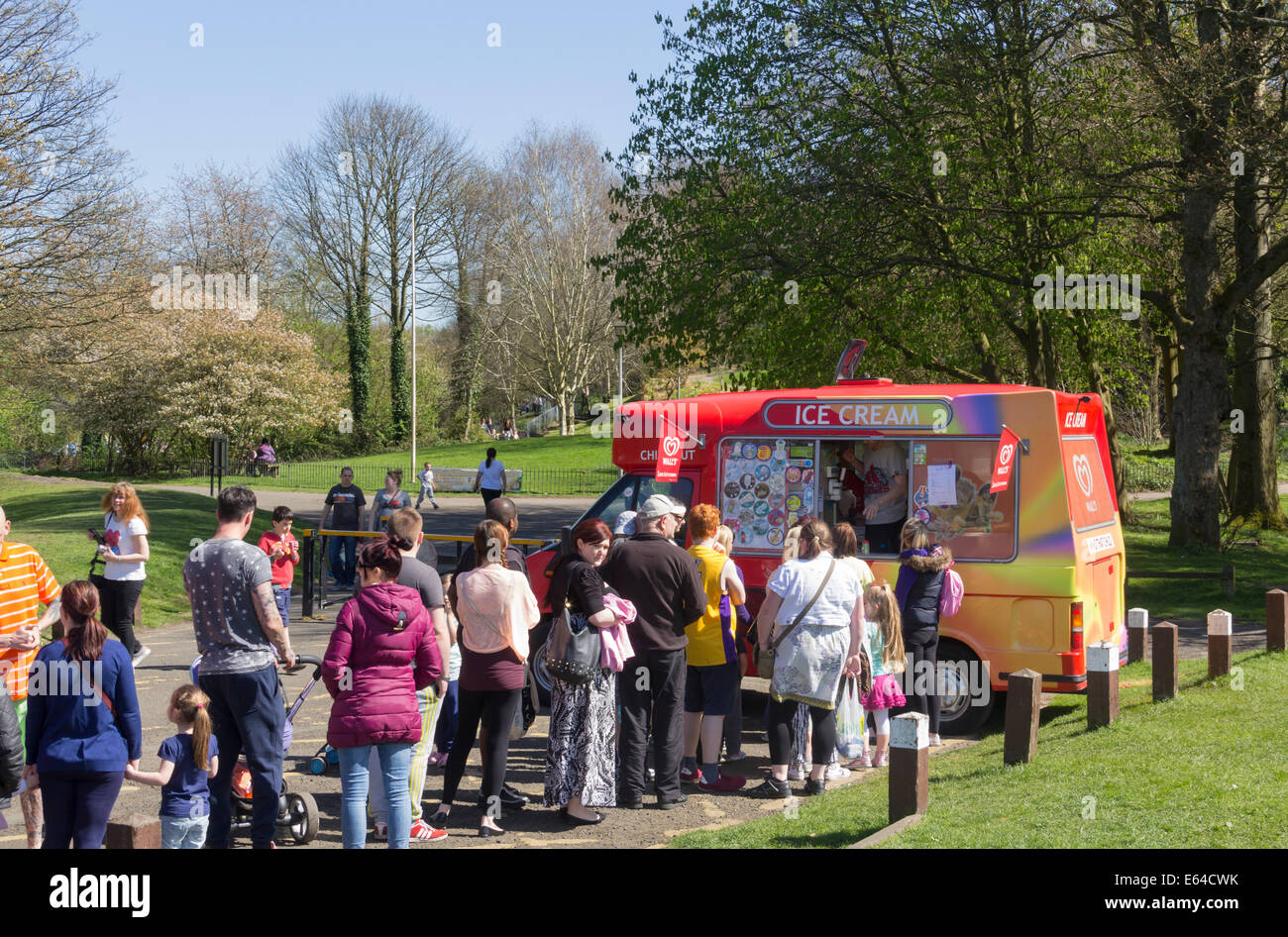 A queue of customers at an ice cream van in Moses Gate Country Park ...