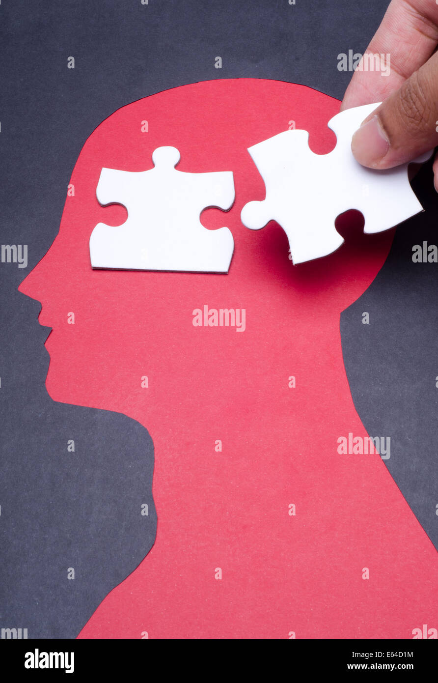 Jigsaw puzzle pieces on the human head Stock Photo - Alamy