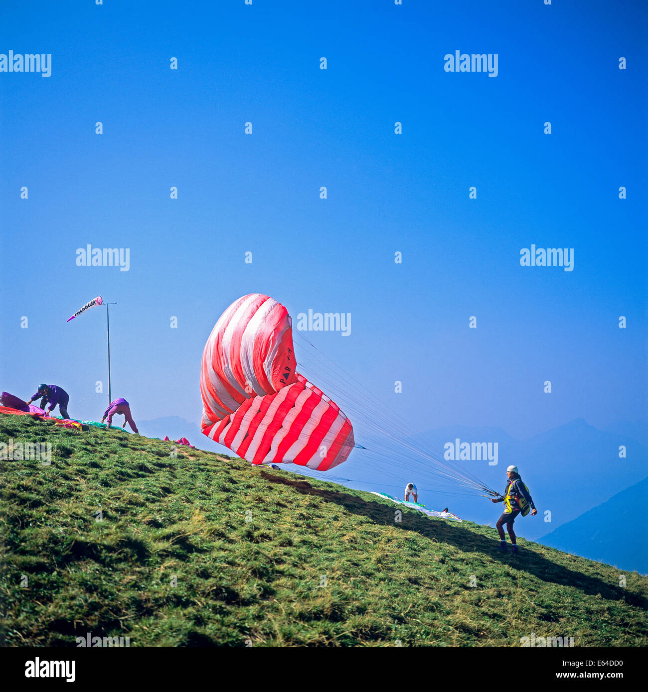 Paraglider taking off slope hi-res stock photography and images - Alamy