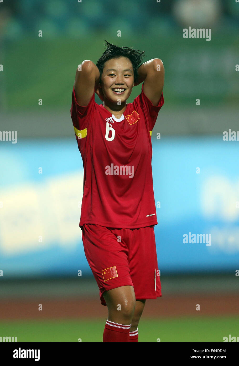 Nanjing, China. 14th Aug, 2014. Ma Xiaolan of China reacts during the ...