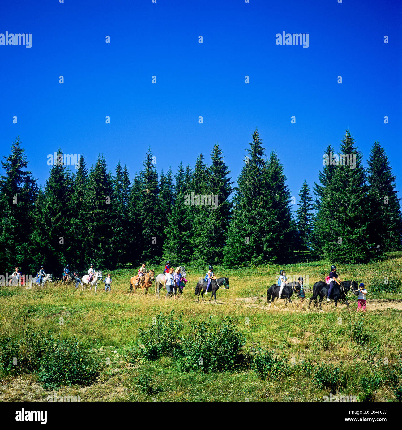Horse-riding children in Avoriaz resort of Morzine Savoy French Alps ...