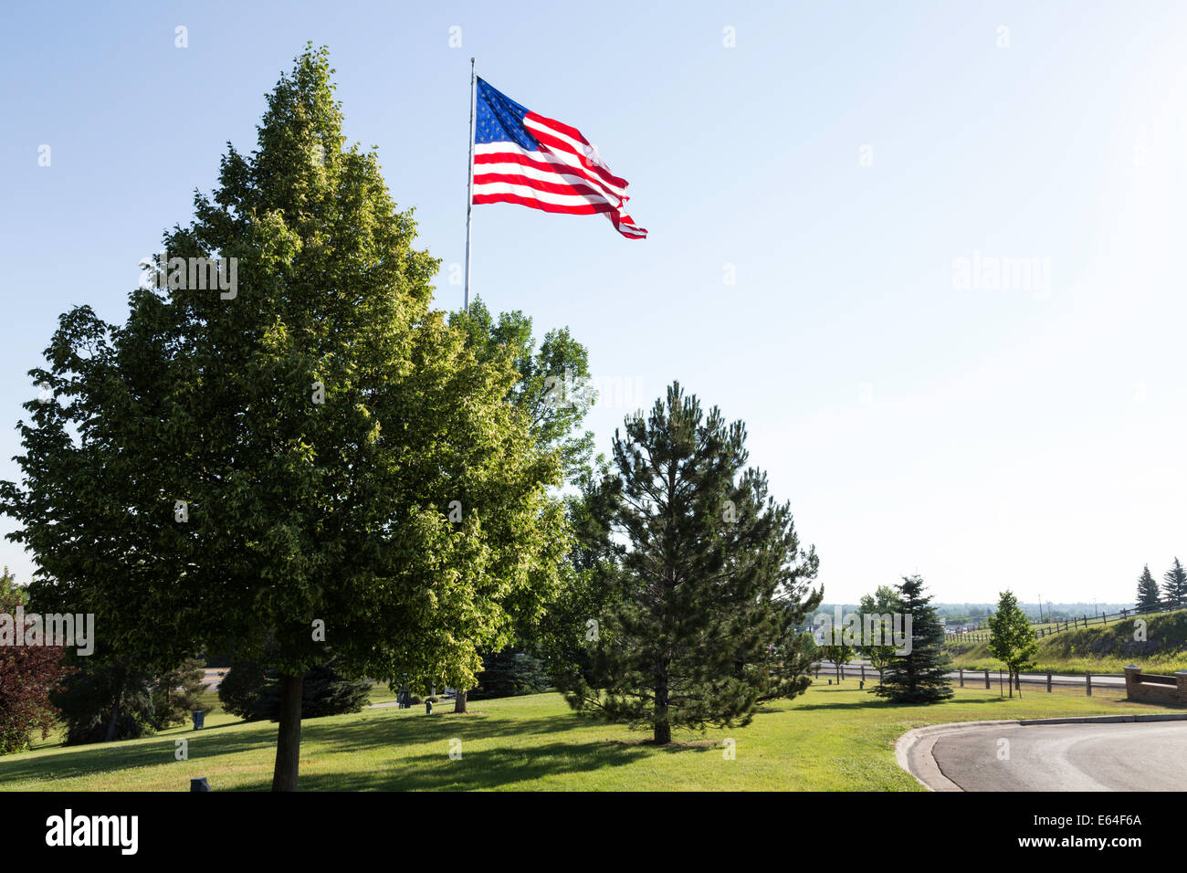 American flag waves outside hi-res stock photography and images - Alamy