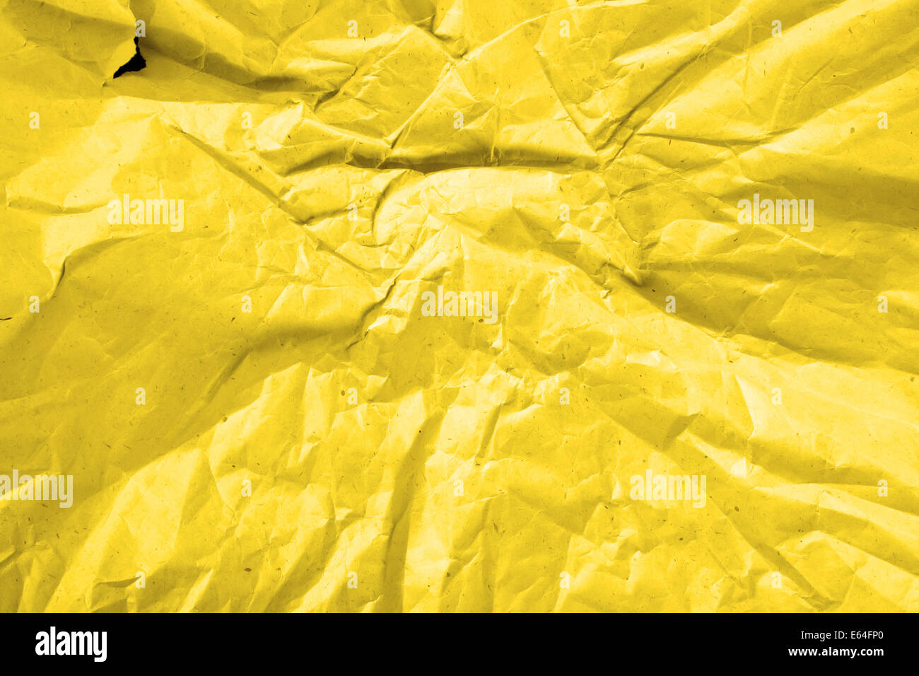 Crumpled deep yellow paper, may be used as background Stock Photo - Alamy