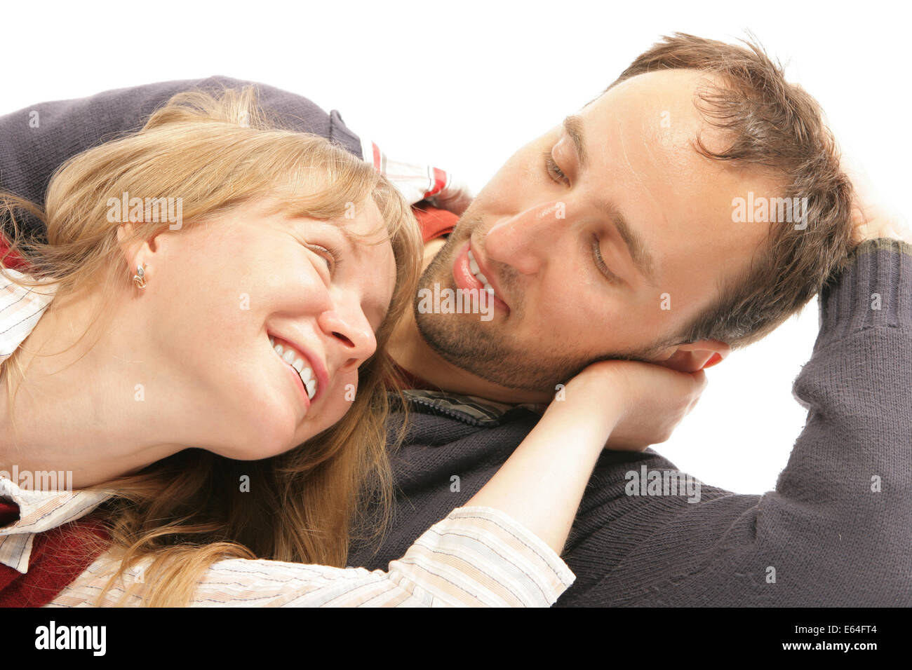 Attractive young couple close-up isolated over white background Stock ...